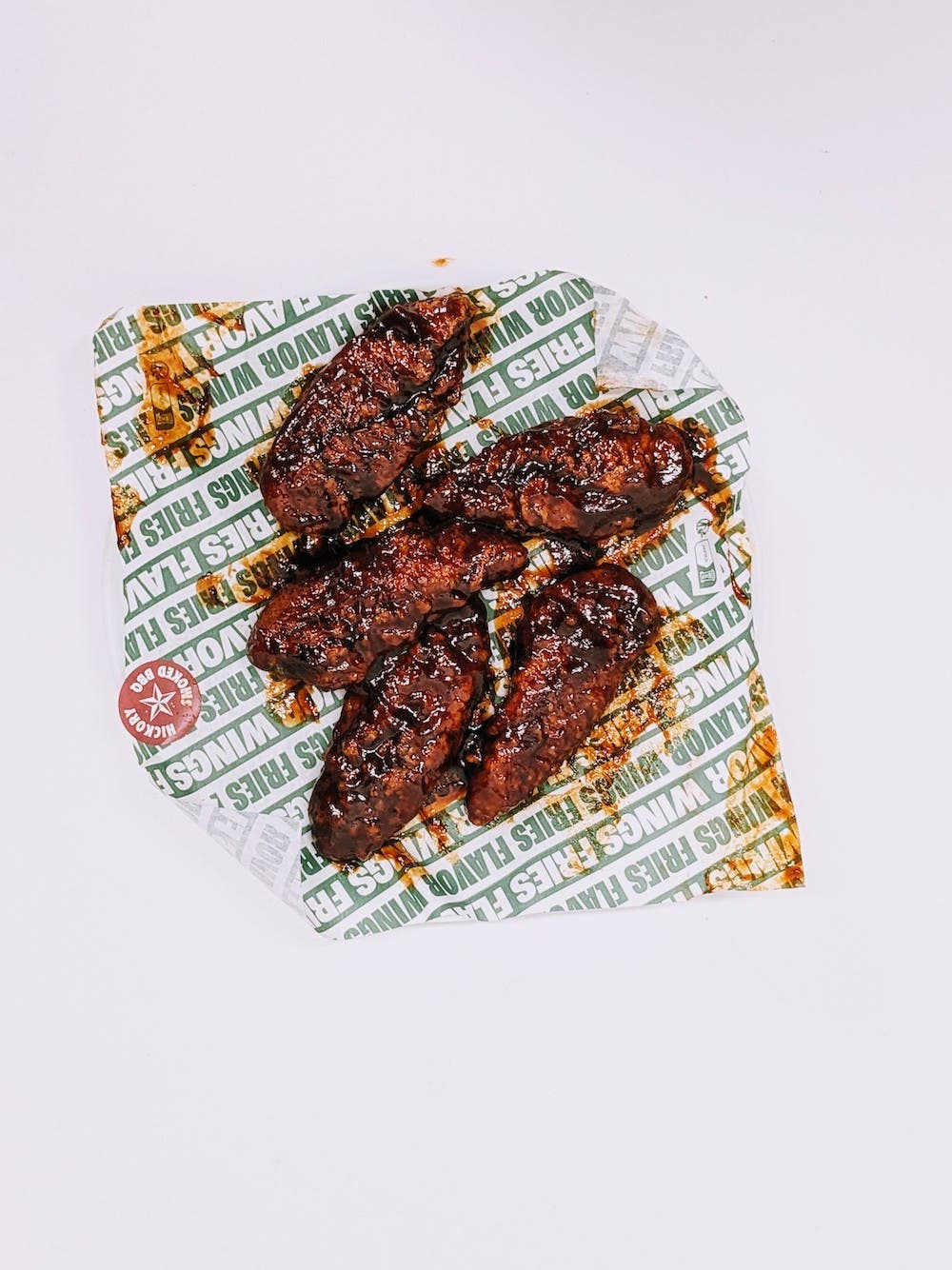 On a testé Wingstop, le poulet frit rendu célèbre par Rick Ross qui ...